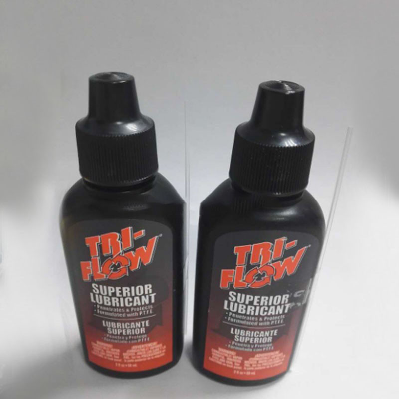 Authentic American TRI-FLOW nozzle maintenance oil lubricant